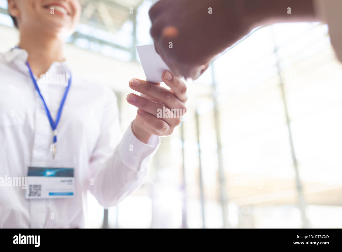 Close-up of business people exchanging business card Stock Photo - Alamy