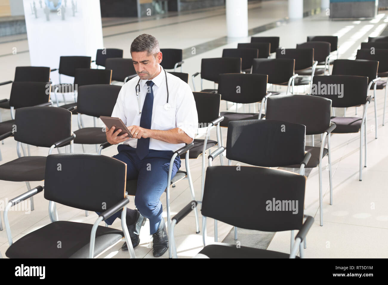 Doctor sitting chair hi-res stock photography and images - Alamy