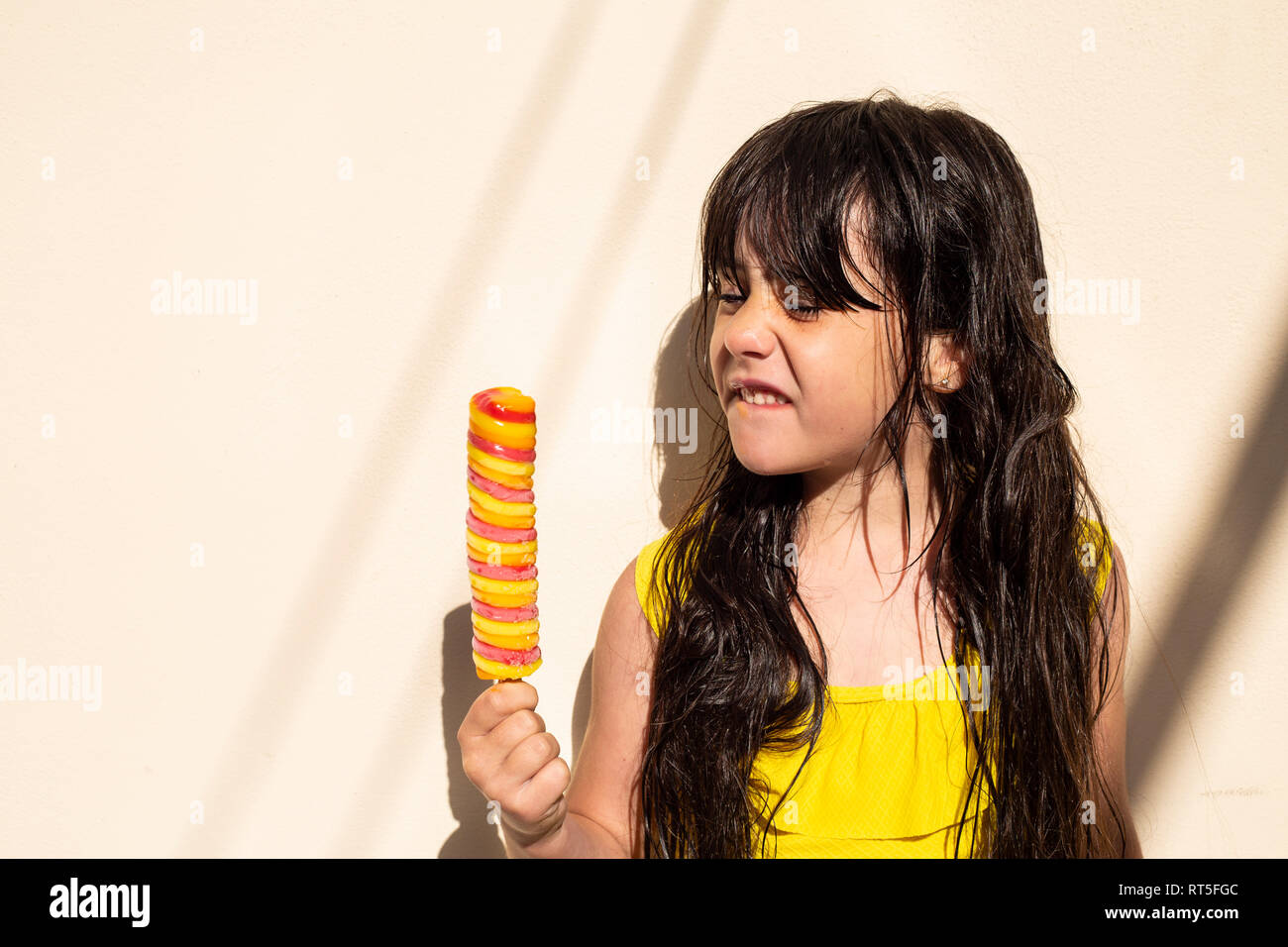 Portrait of little girl with popsicle Stock Photo - Alamy