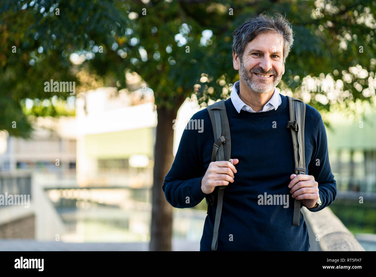 People wearing day backpacks hi-res stock photography and images - Alamy