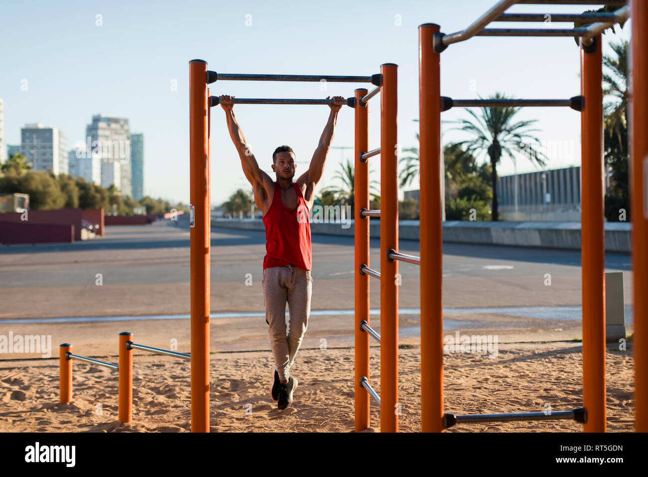 Man doing pull ups exercises hi-res stock photography and images - Alamy