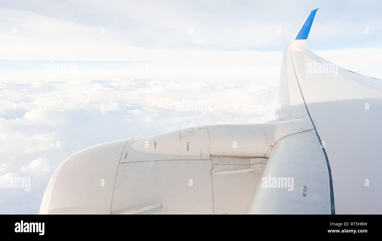View from the window seat of commercial passenger airplane Stock Photo ...
