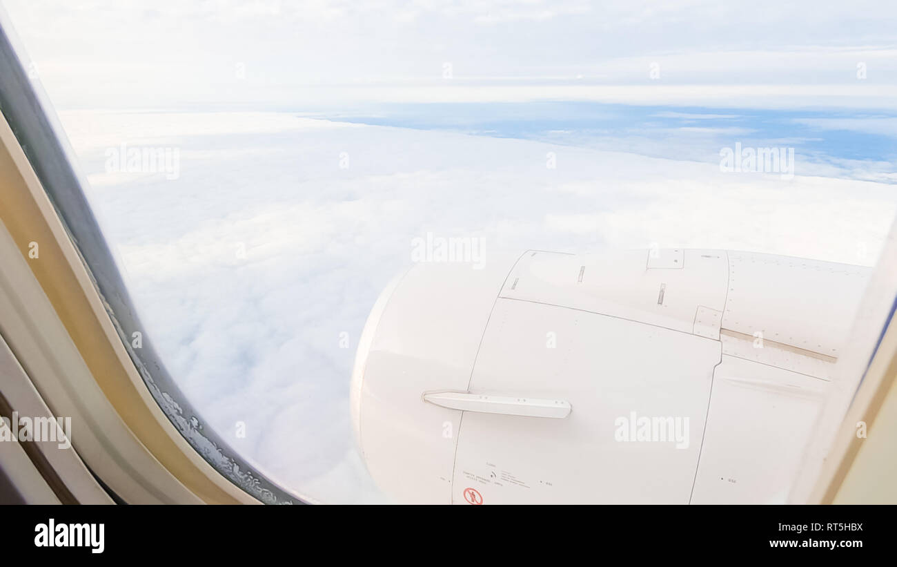 View from the window seat of commercial passenger airplane Stock Photo ...