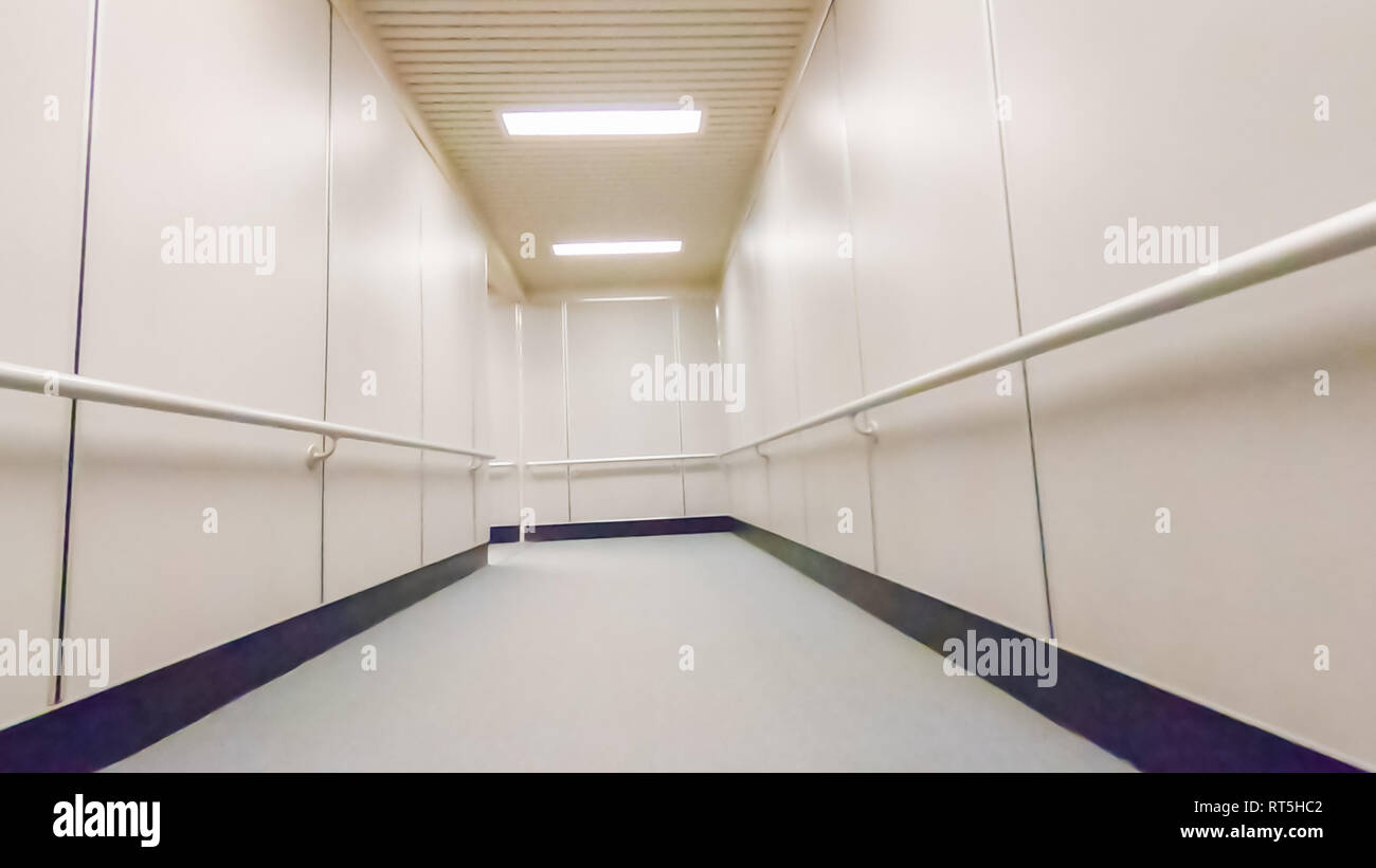Inside of the aircraft bridge connecting airport terminal and passenger ...