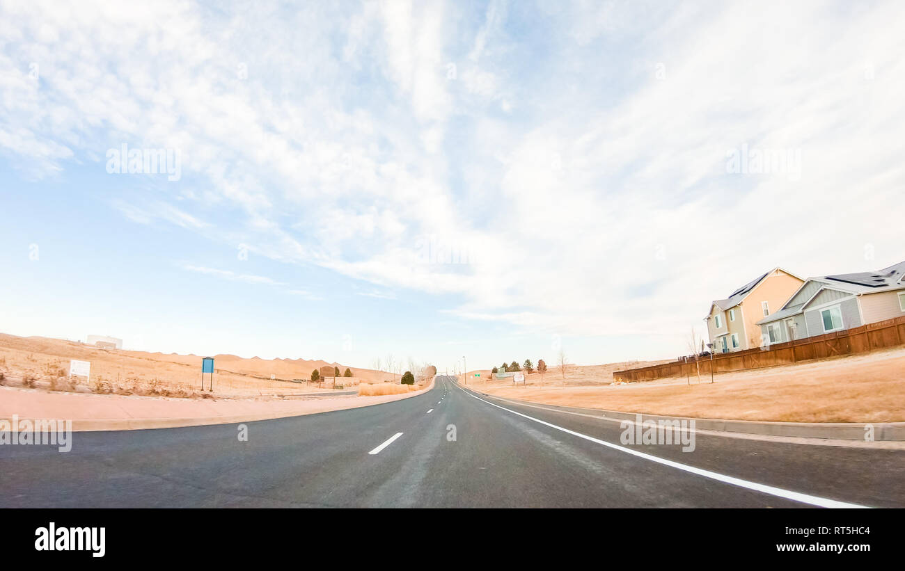 Driving through new residential neighborhood in suburbia Stock Photo ...
