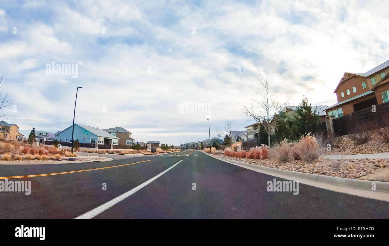 Driving through new residential neighborhood in suburbia Stock Photo ...