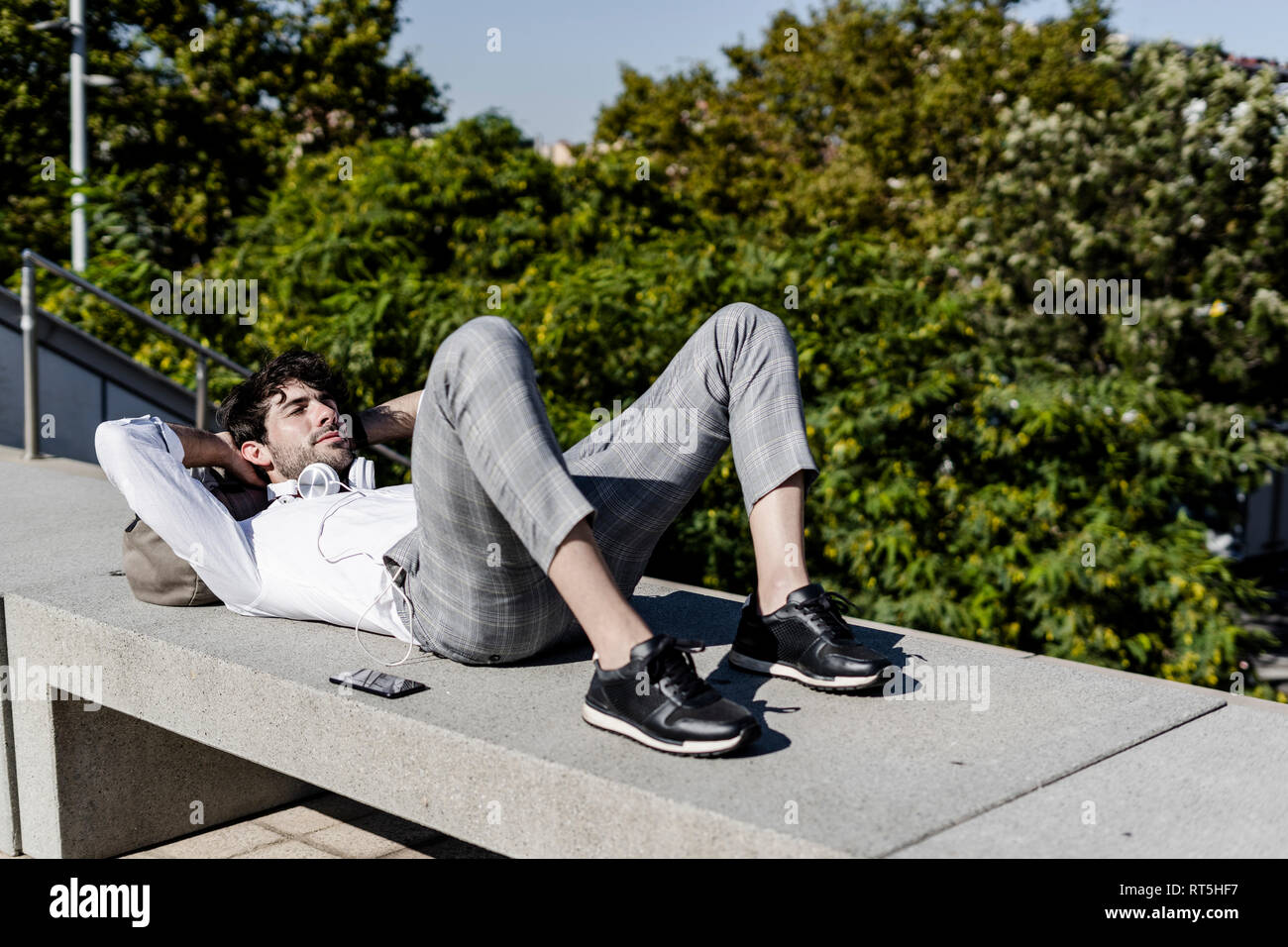 Man lying bench hi-res stock photography and images - Alamy