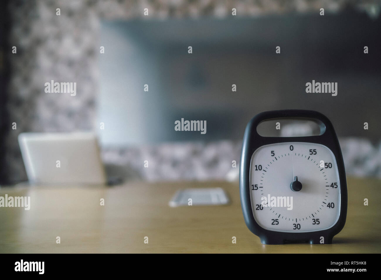 Timer on a desk in a board room Stock Photo - Alamy