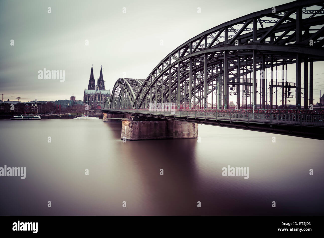 Germany, Cologne, view to Cologne Cathedral with Hohenzollern Bridge ...