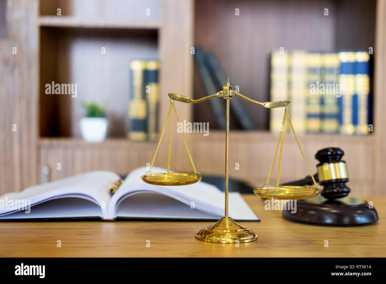 Symbol of Judge law attorney gavel with Justice lawyers table desktop ...