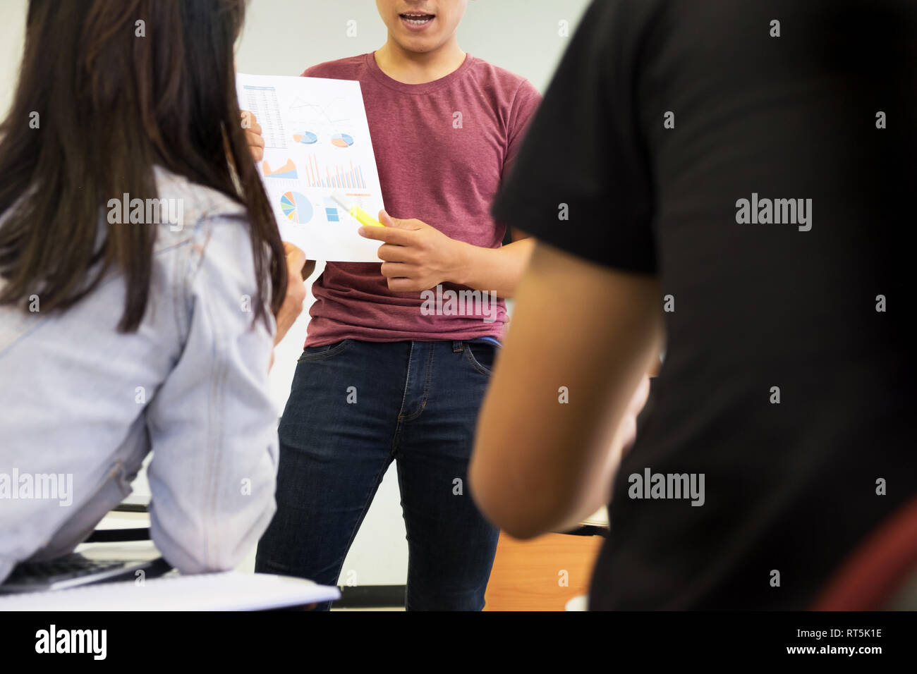 Adult students group listen to professor's lecture and Asking Question ...