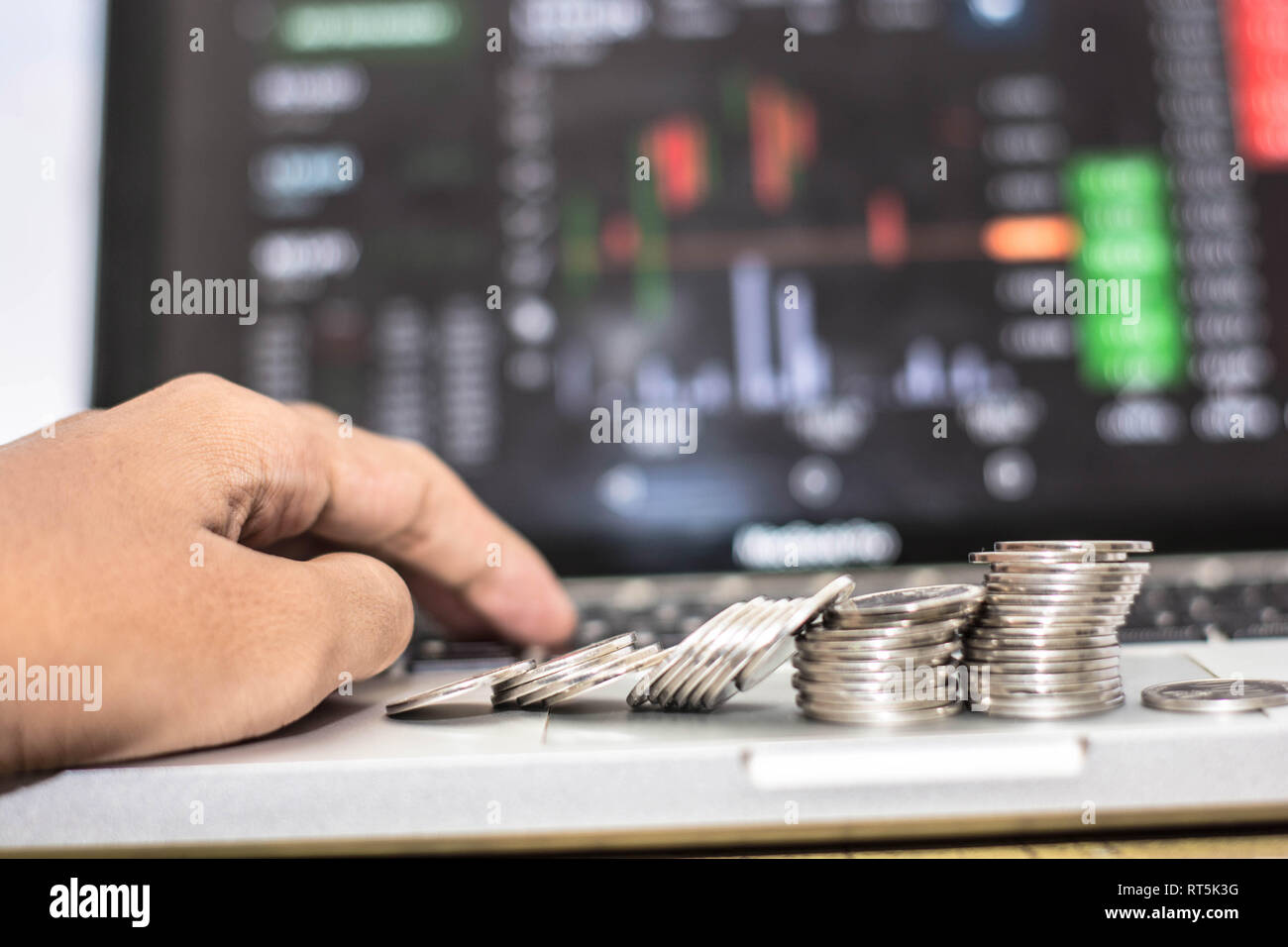 silver coin with monitor shows trading traffic, Bitcoin minning, coin ...