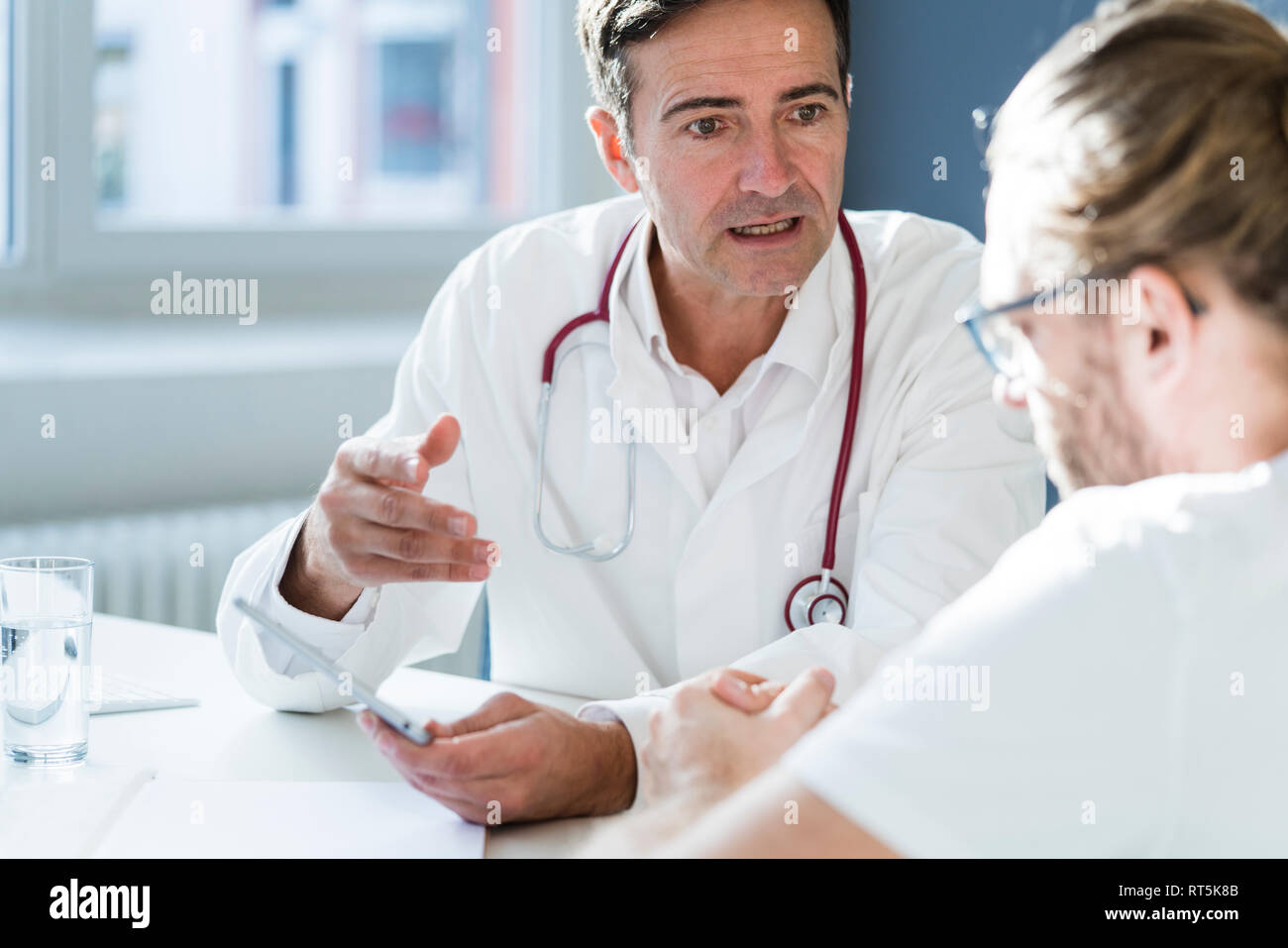 Showing doctor hi-res stock photography and images - Alamy