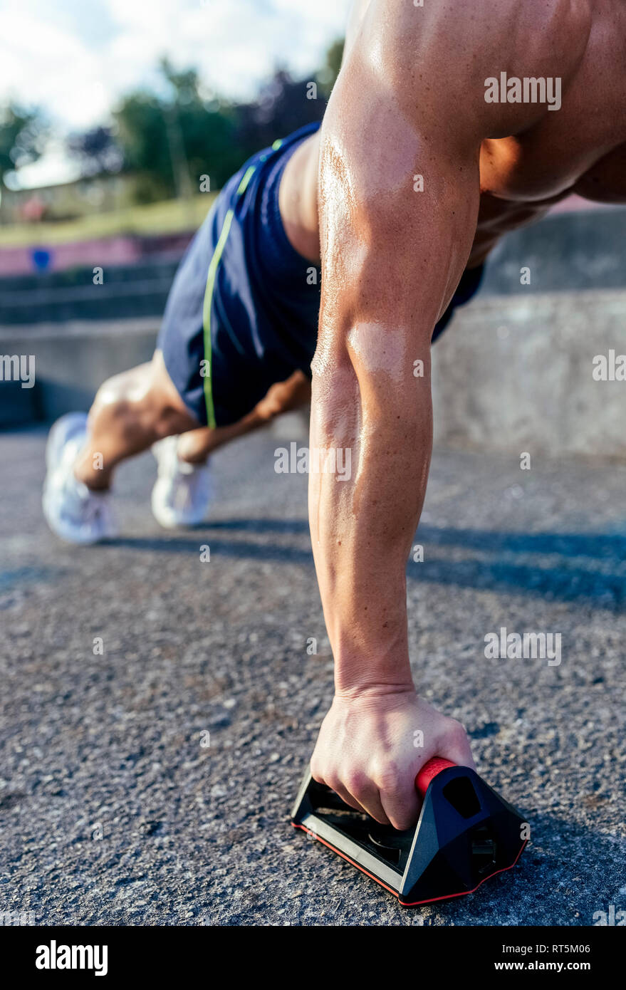 Determined male athlete pushups on hi-res stock photography and images ...
