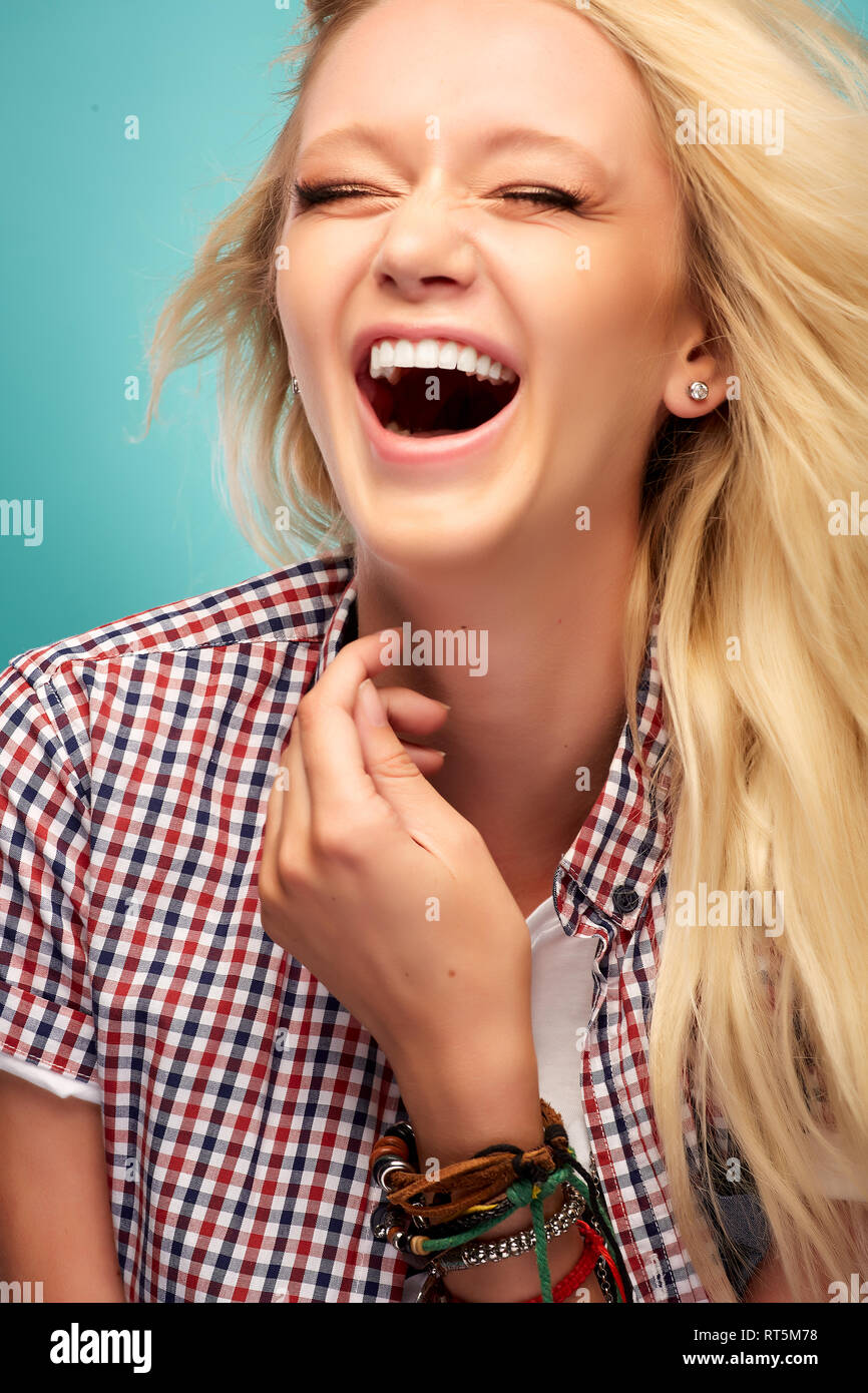 Young lady laughing Stock Photo - Alamy