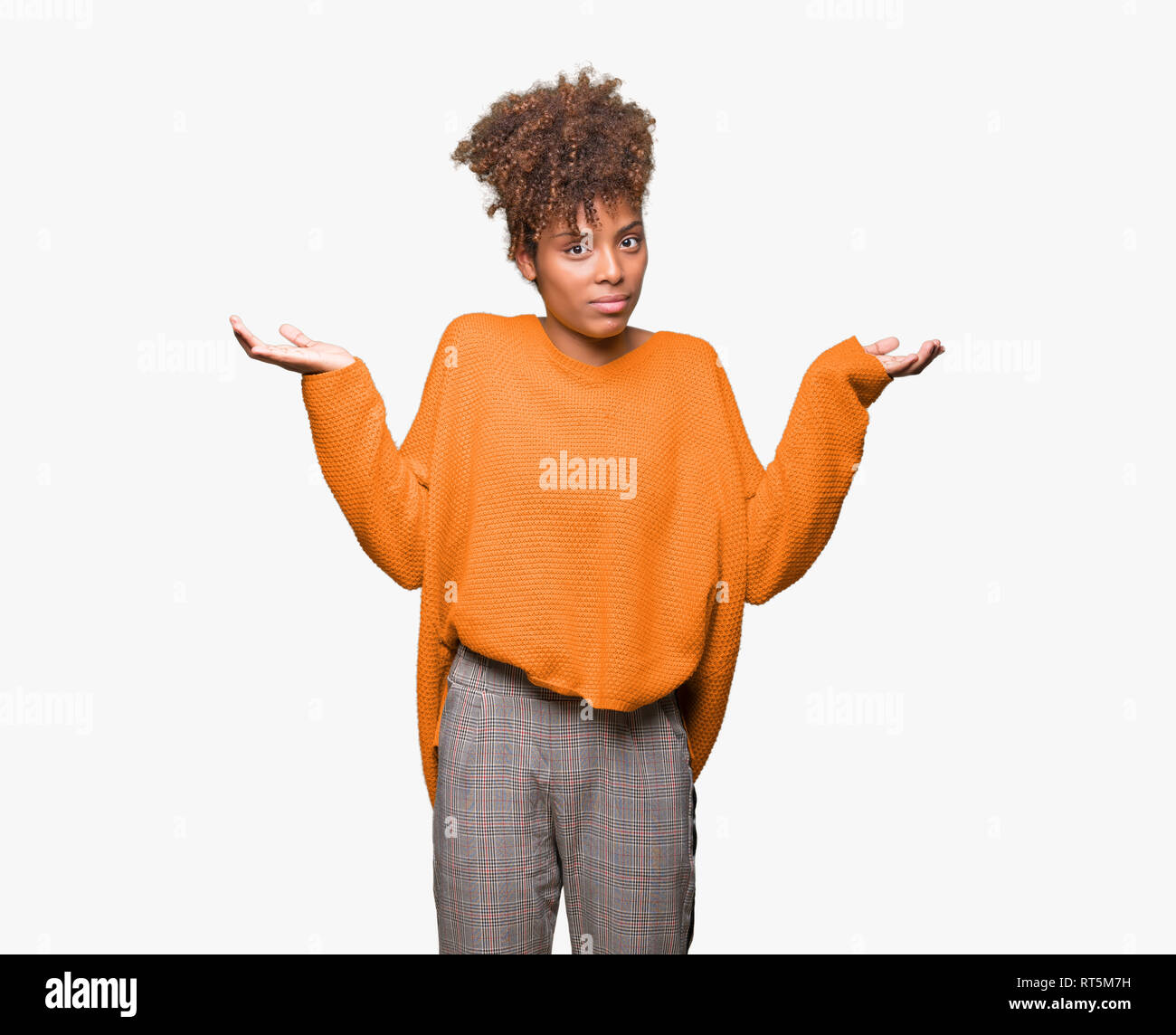 Beautiful young african american woman over isolated background ...