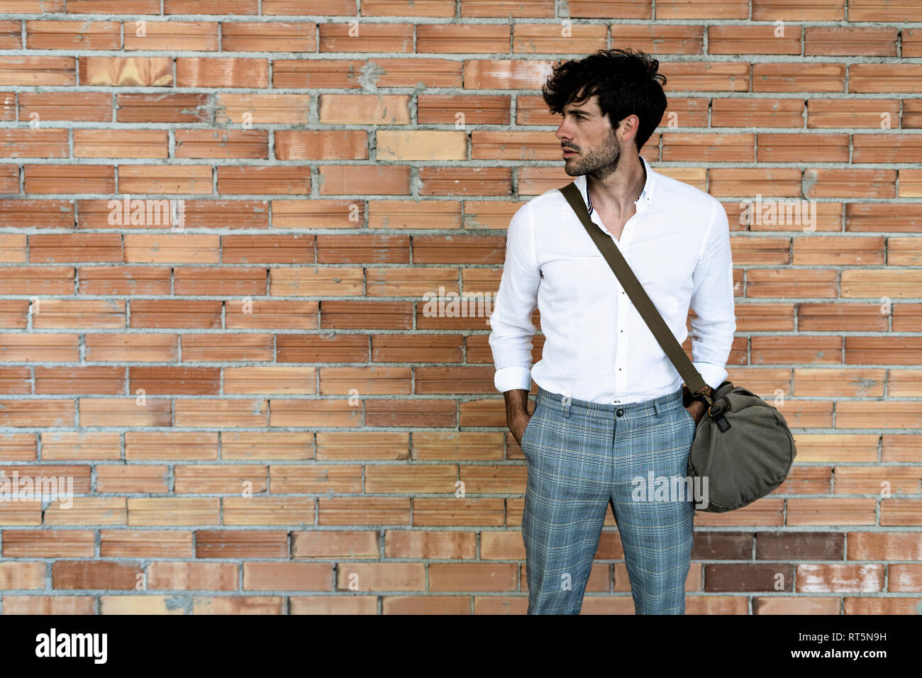 Man bag hi-res stock photography and images - Alamy