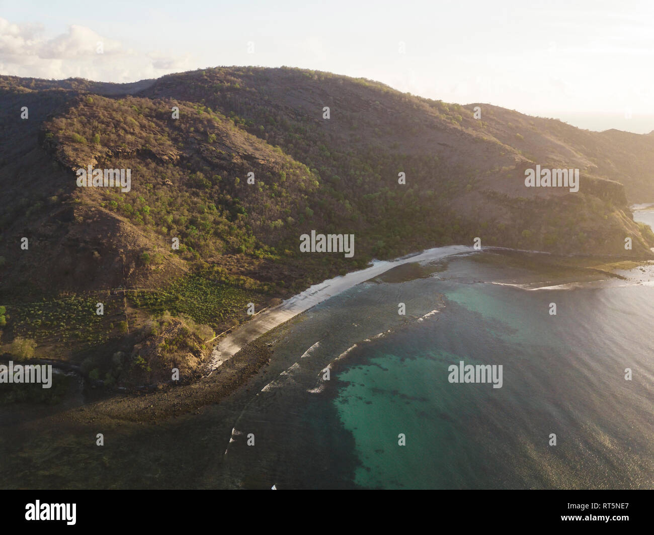 Indonesia, West Sumbawa, Aerial view of Jelengah beach, Scar reef surf ...