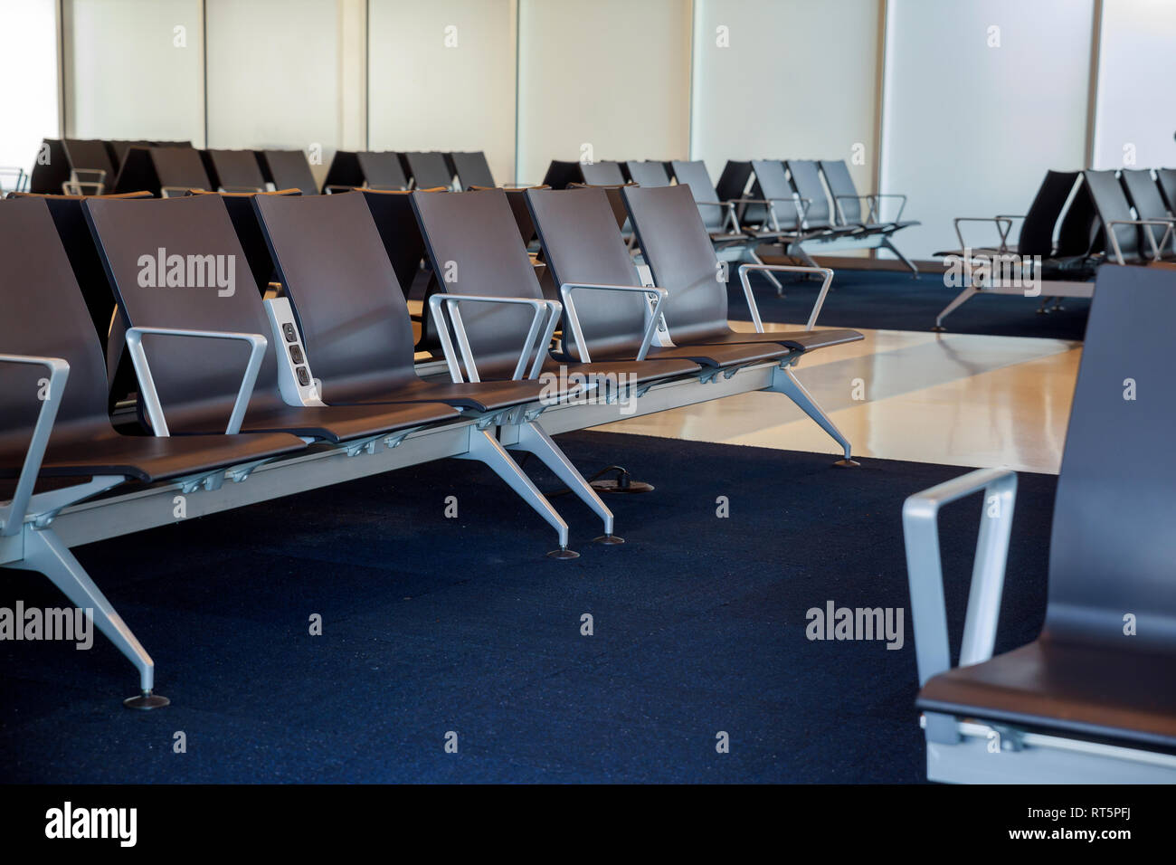 Empty departure lounge airport terminal waiting area with chairs Stock ...