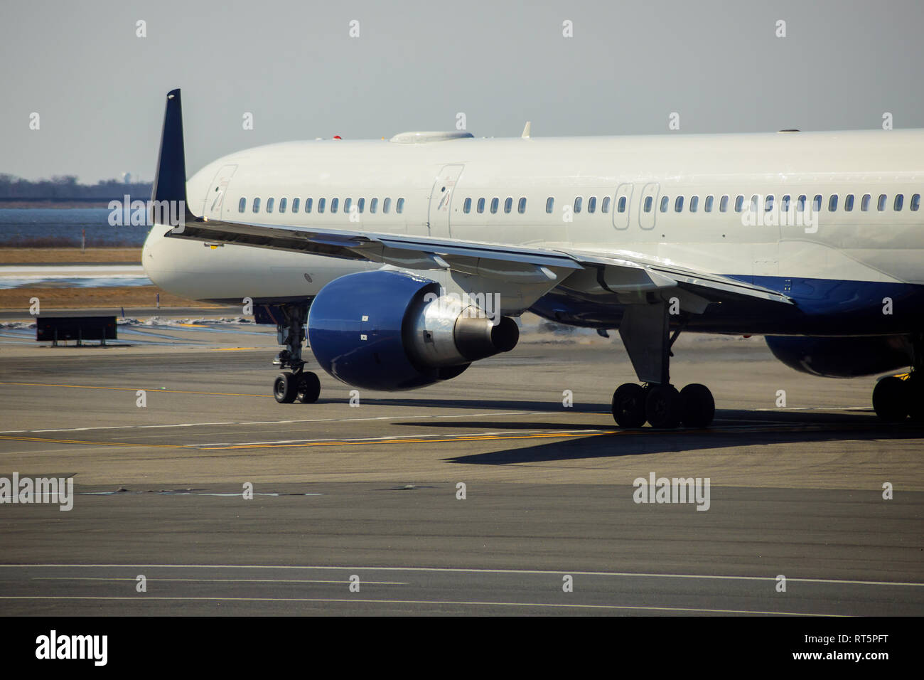 The turbine of the aircraft plane is preparing to fly at the airplane ...