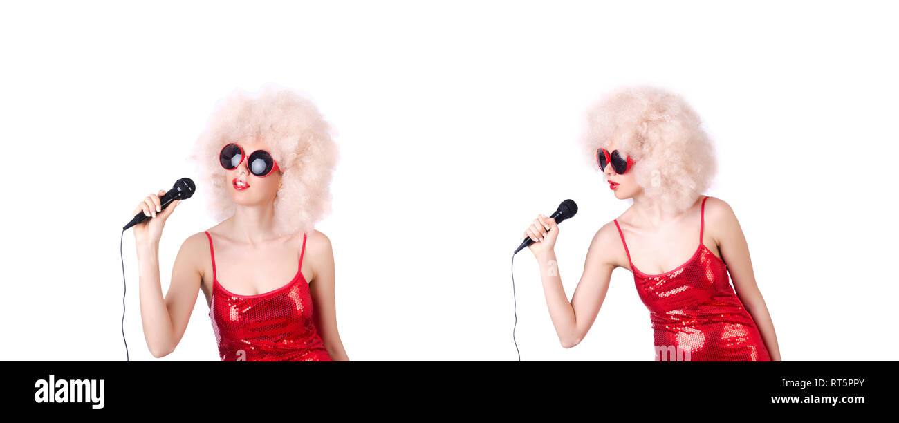 Pop star with mic on white Stock Photo - Alamy