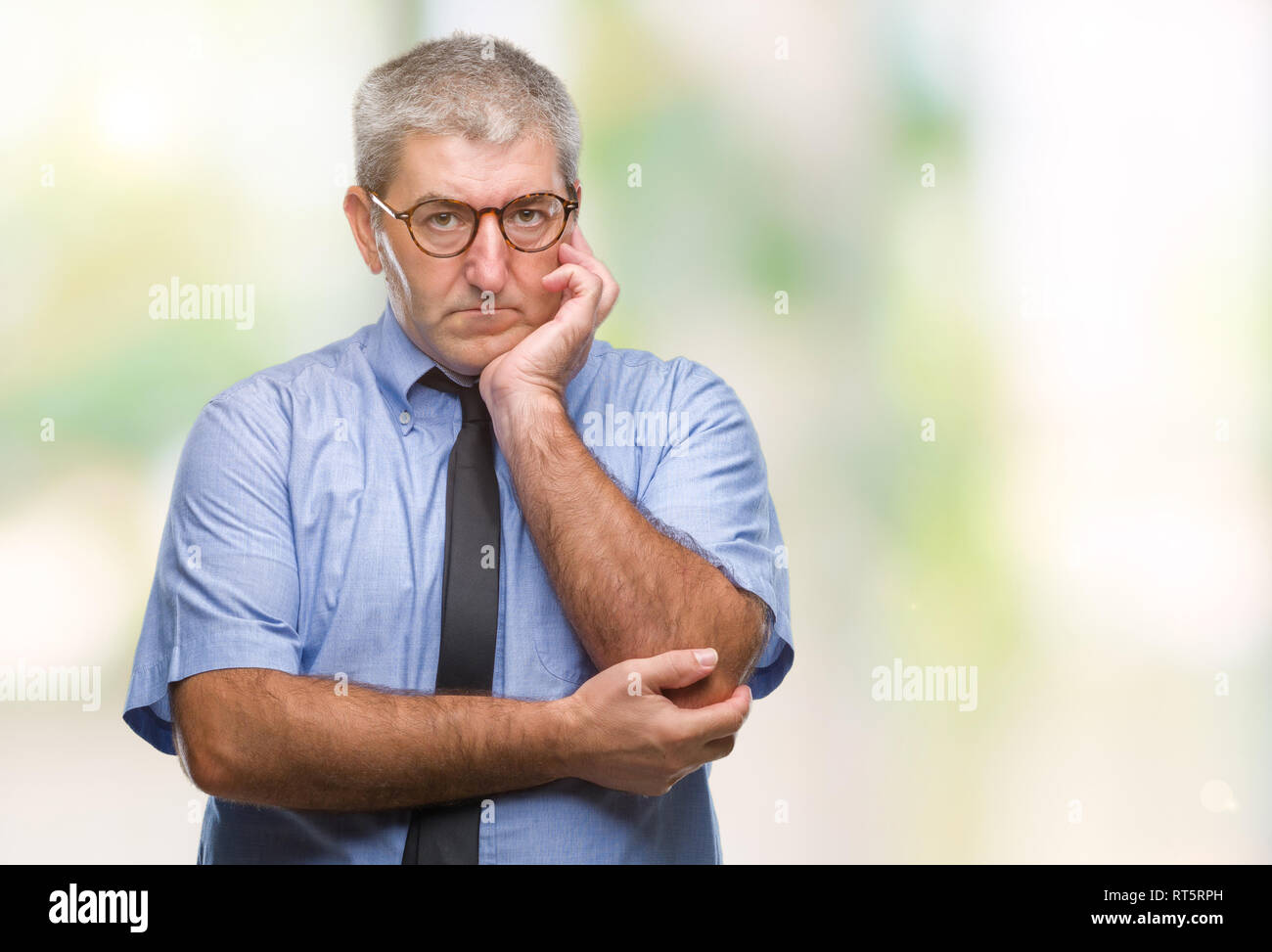 Handsome senior business man over isolated background thinking looking ...