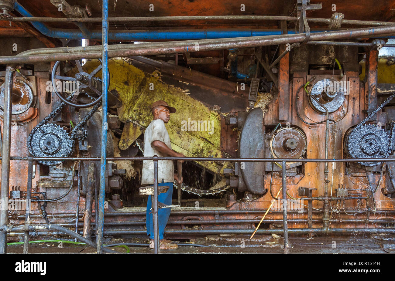 Brickaville, Madagascar, November 8, 2014: A Malagasy worker repairing ...