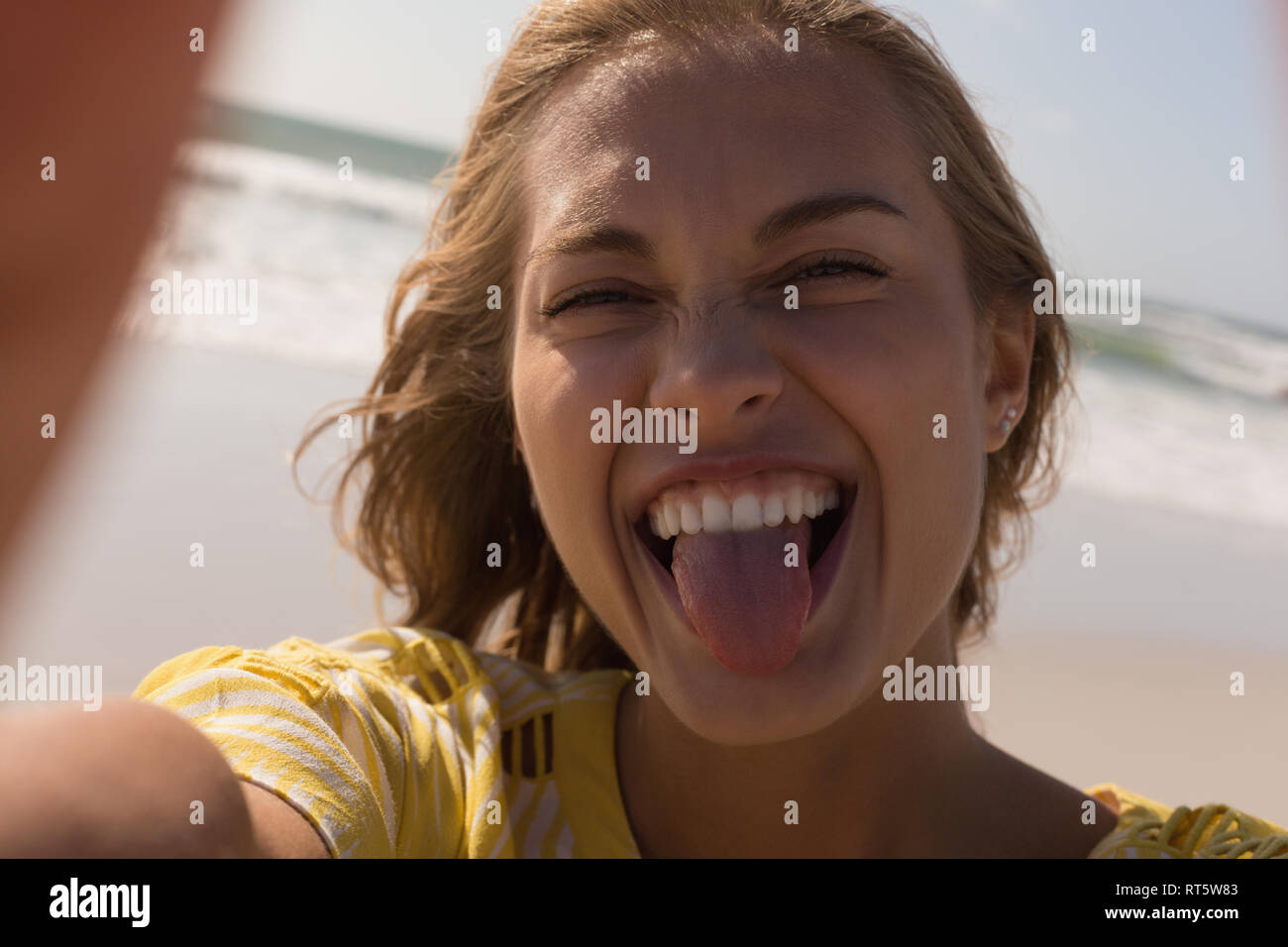 Woman fun on beach hi-res stock photography and images - Alamy