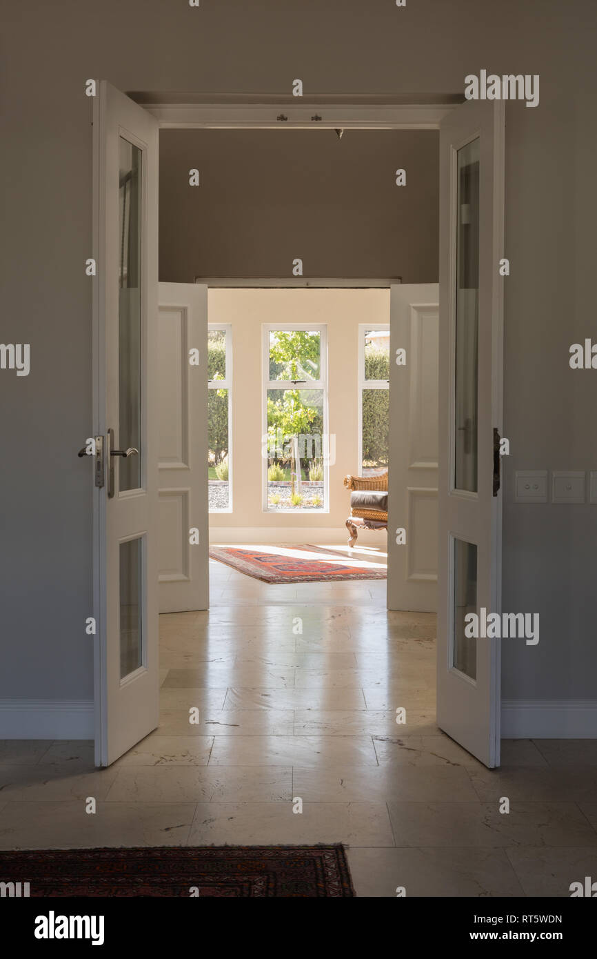 Interior of opened door at home Stock Photo - Alamy