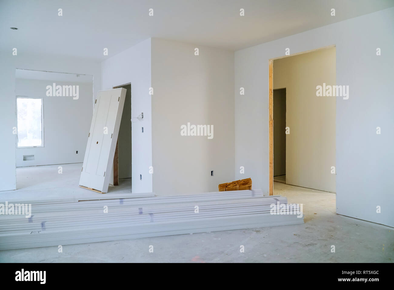 Interior construction of housing project with door and molding ...
