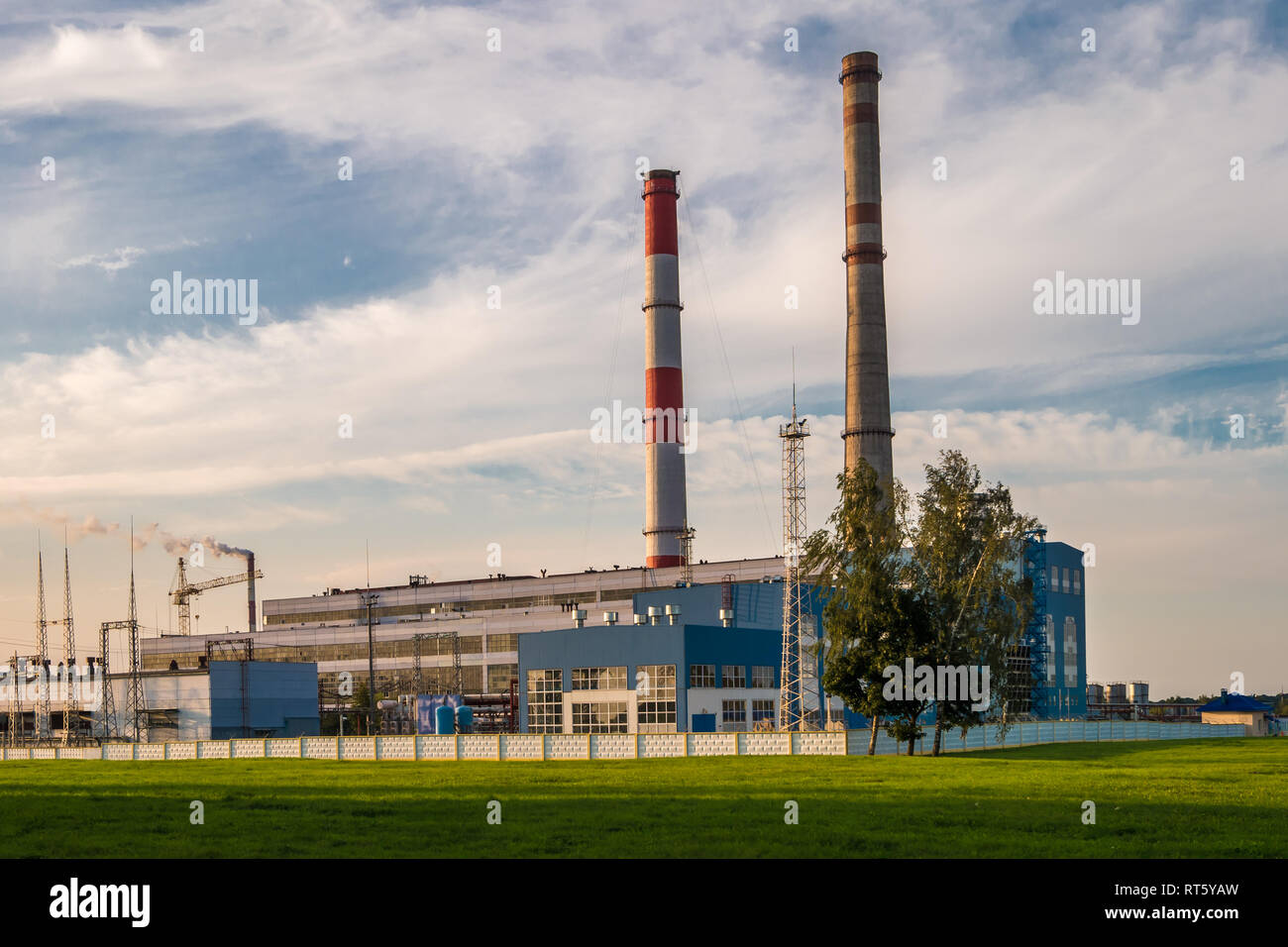 pipes of a chemical enterprise plant. Air pollution concept. Industrial ...