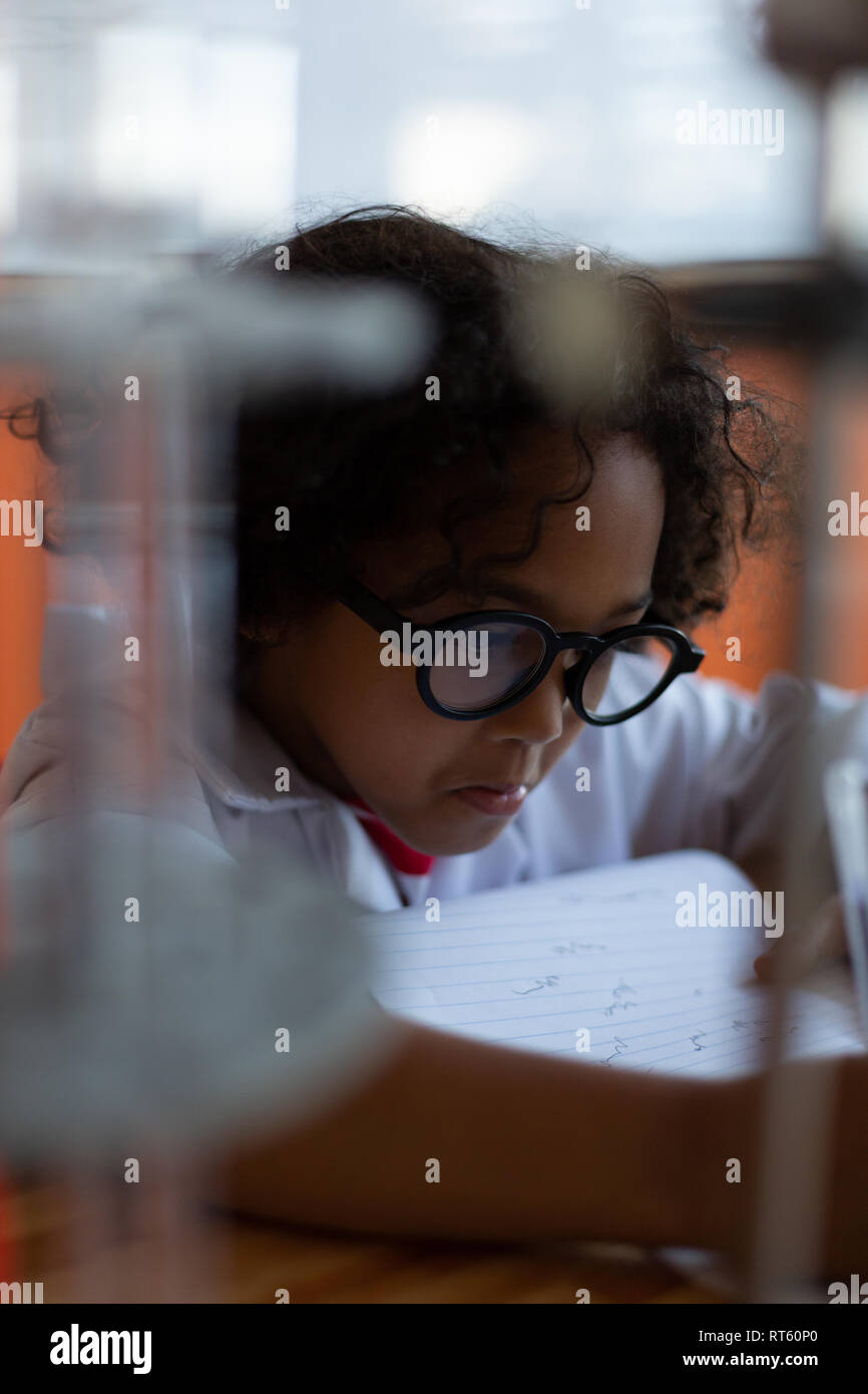 Student writing paper desk hi-res stock photography and images - Alamy