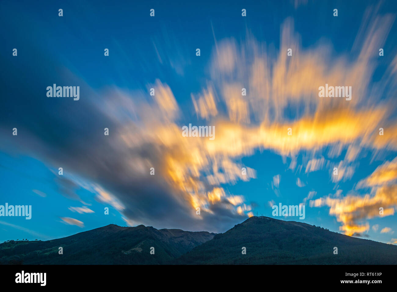 Long exposure photograph of the Pichincha volcano at sunset in Quito ...