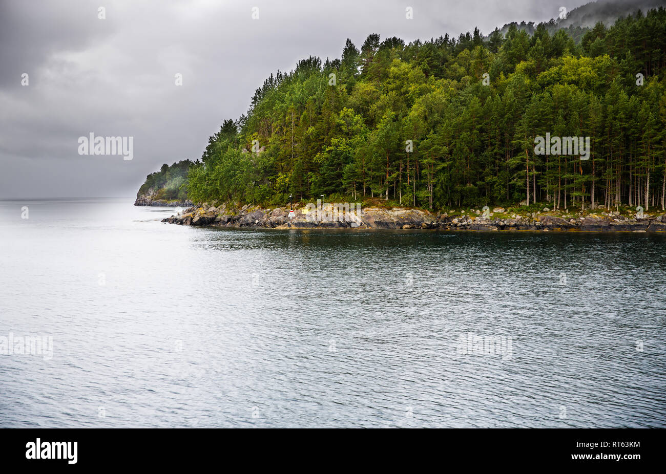 Landscape with forest and fjord in Norway Stock Photo - Alamy