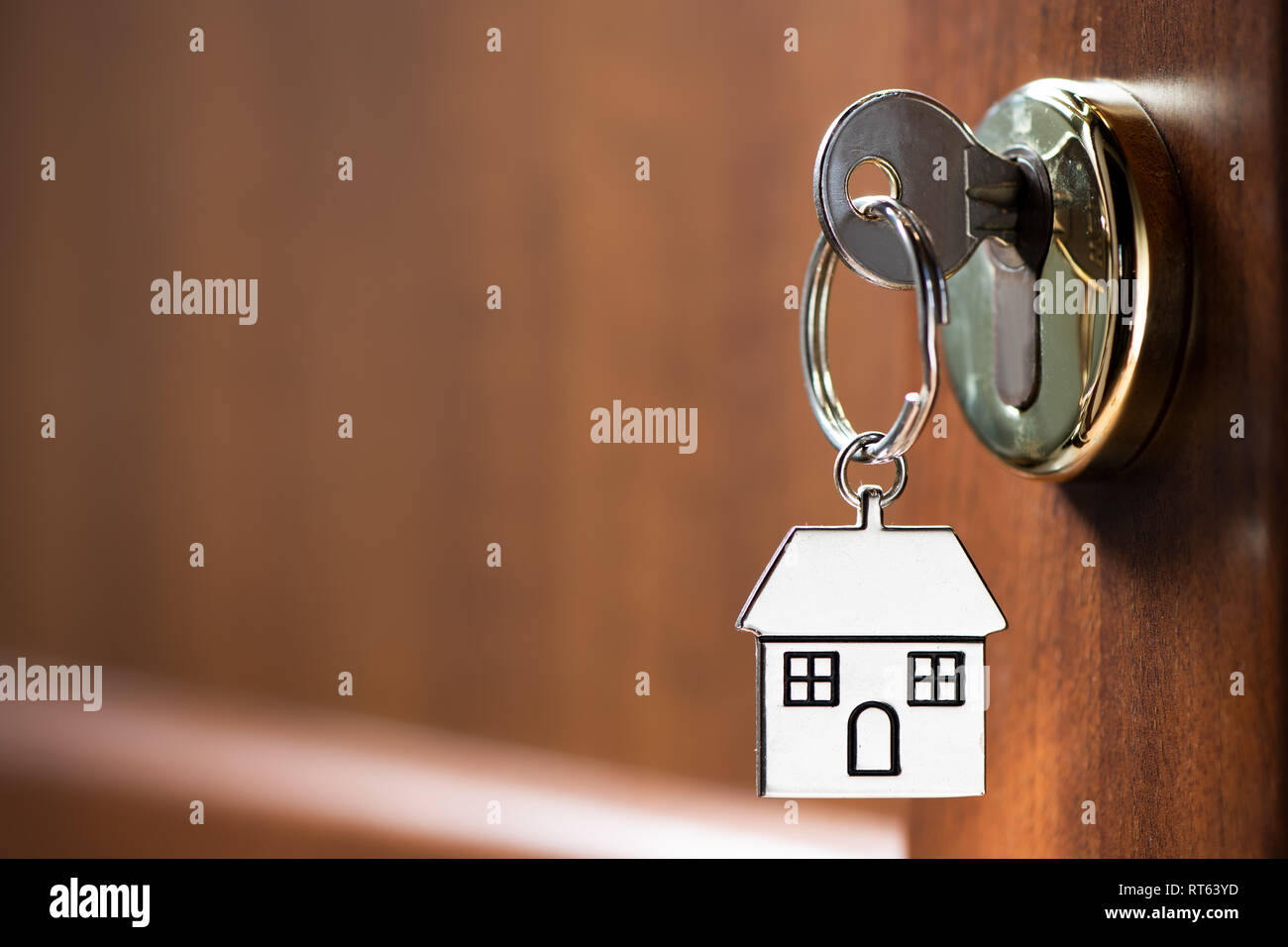 House key in the door Stock Photo - Alamy