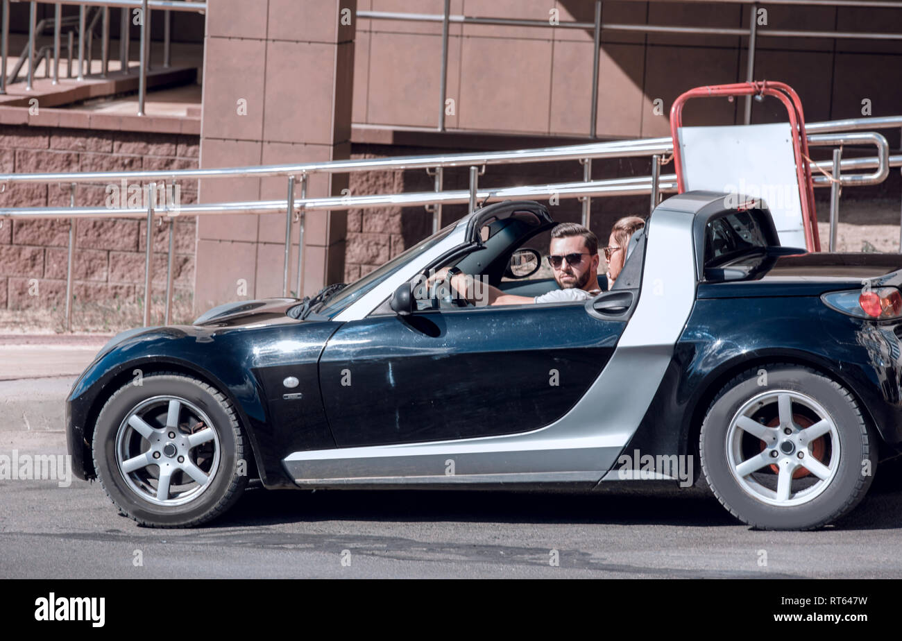 Cool guy driving convertible car hi-res stock photography and images ...