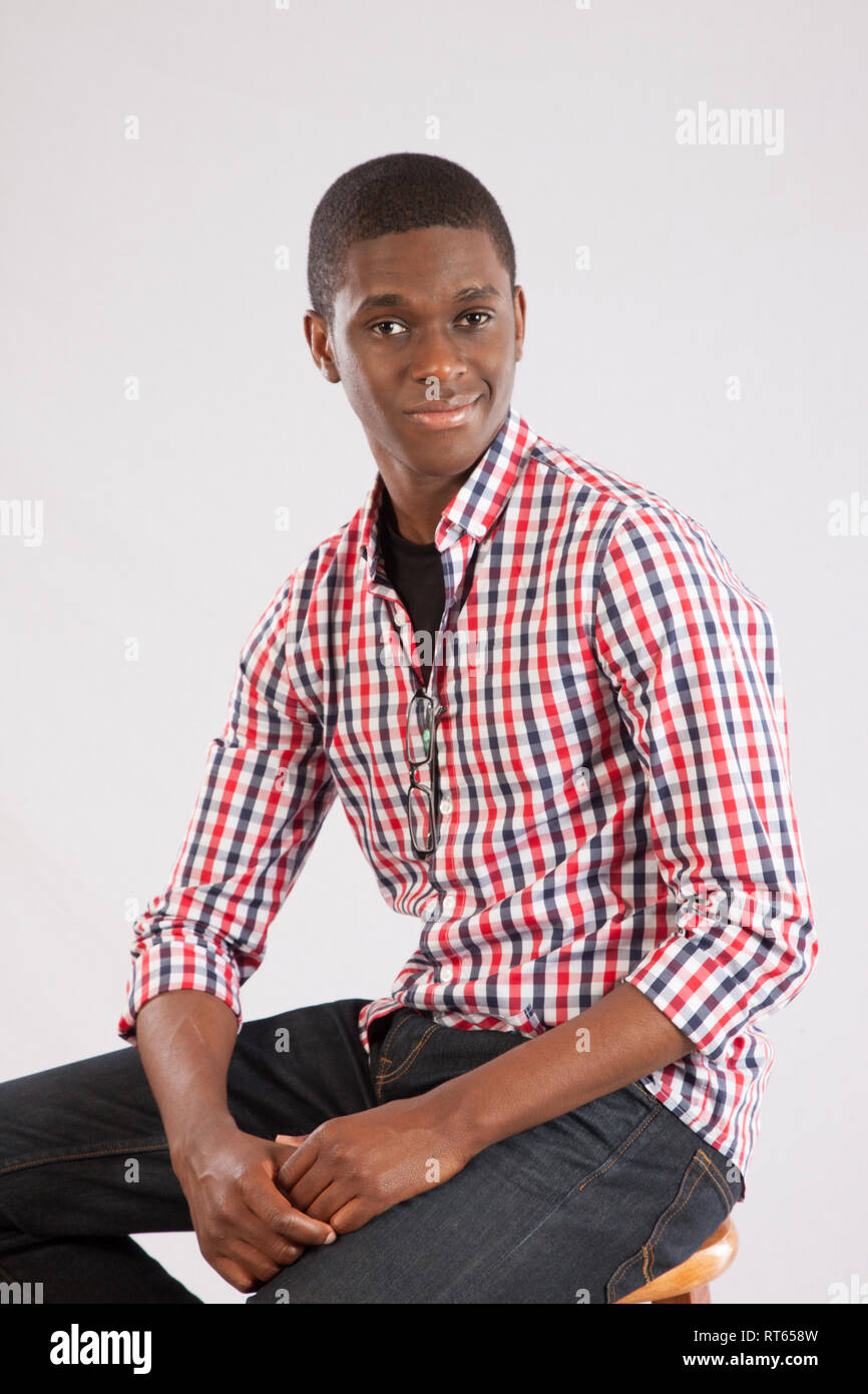 Thoughtful Black man looking seriouis Stock Photo - Alamy