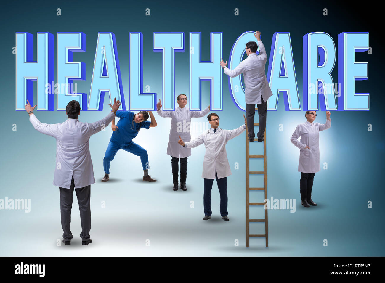 Group of doctors holding healthcare letters Stock Photo - Alamy