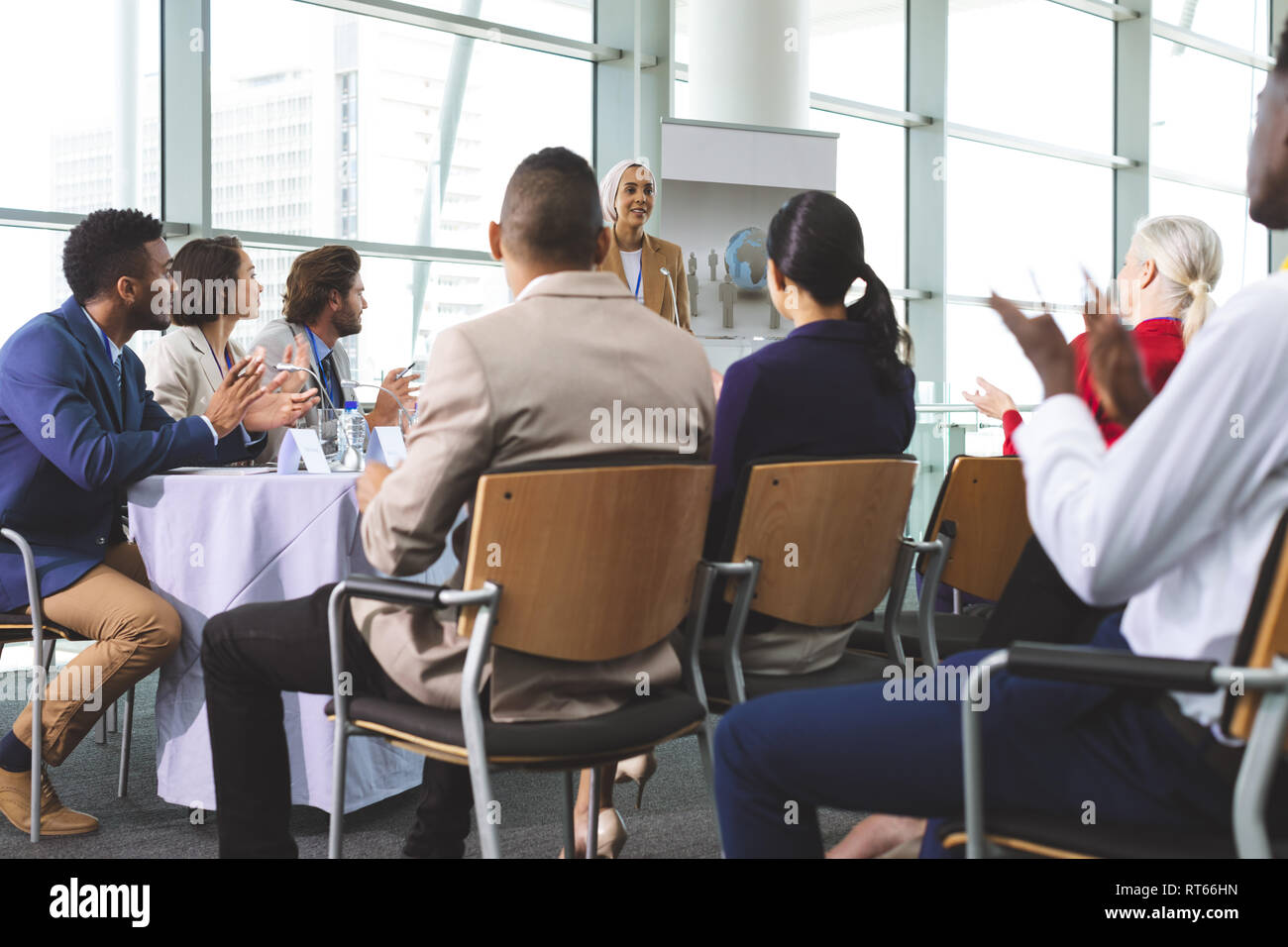 Diverse group audience applauding hi-res stock photography and images ...