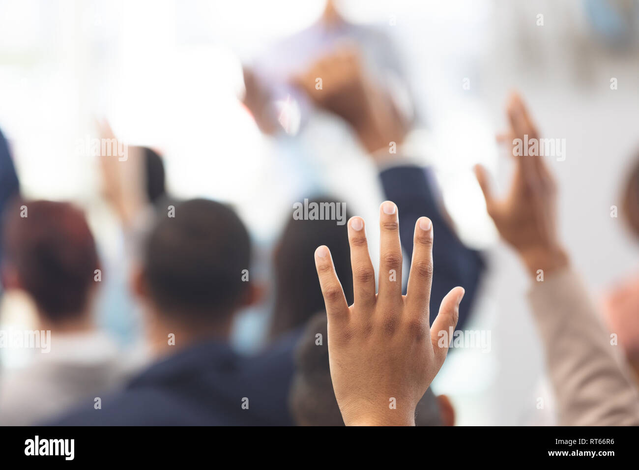 Close up hands raising hi-res stock photography and images - Alamy