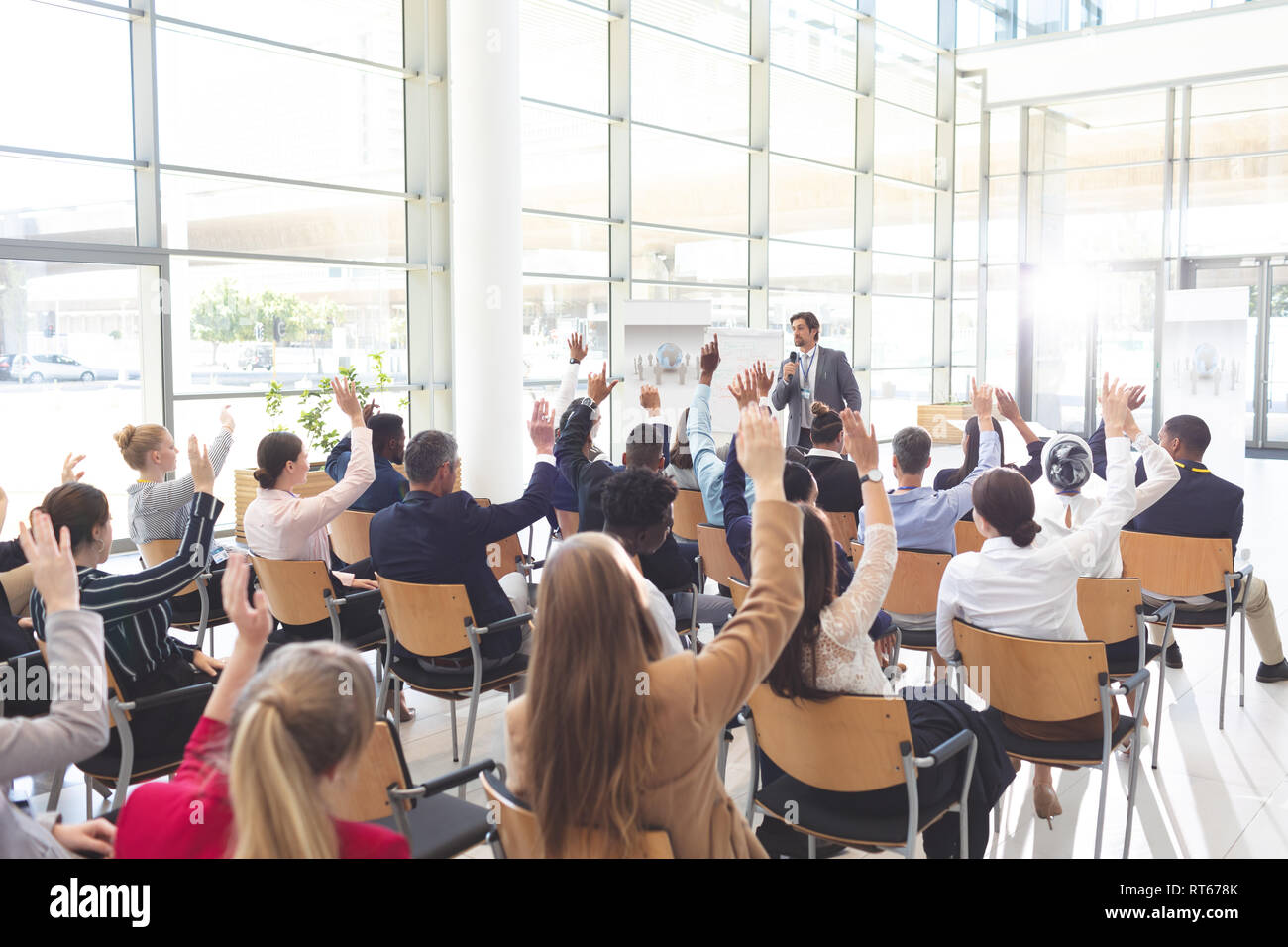 Conference speakers audience hands hi-res stock photography and images ...