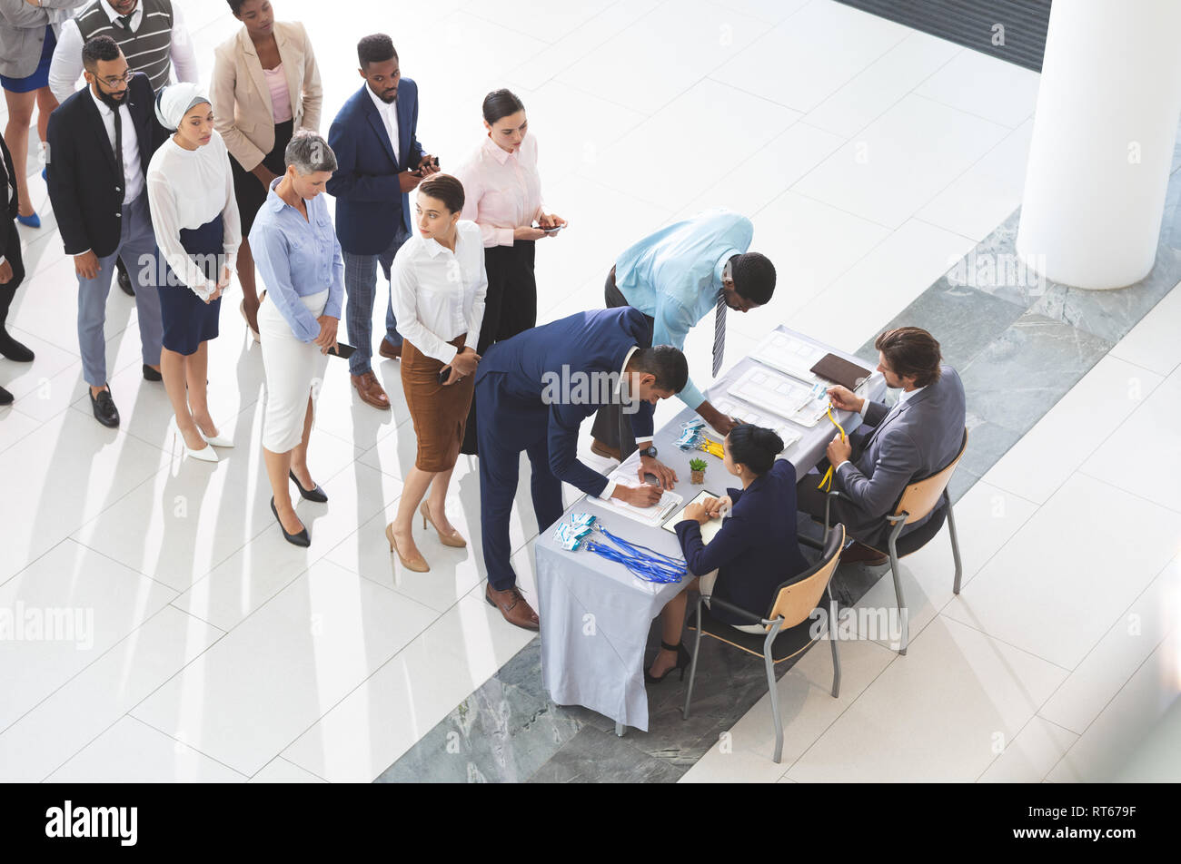 Conference registration table hi-res stock photography and images - Alamy