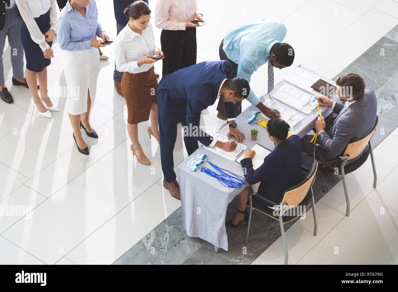 Conference registration table hi-res stock photography and images - Alamy