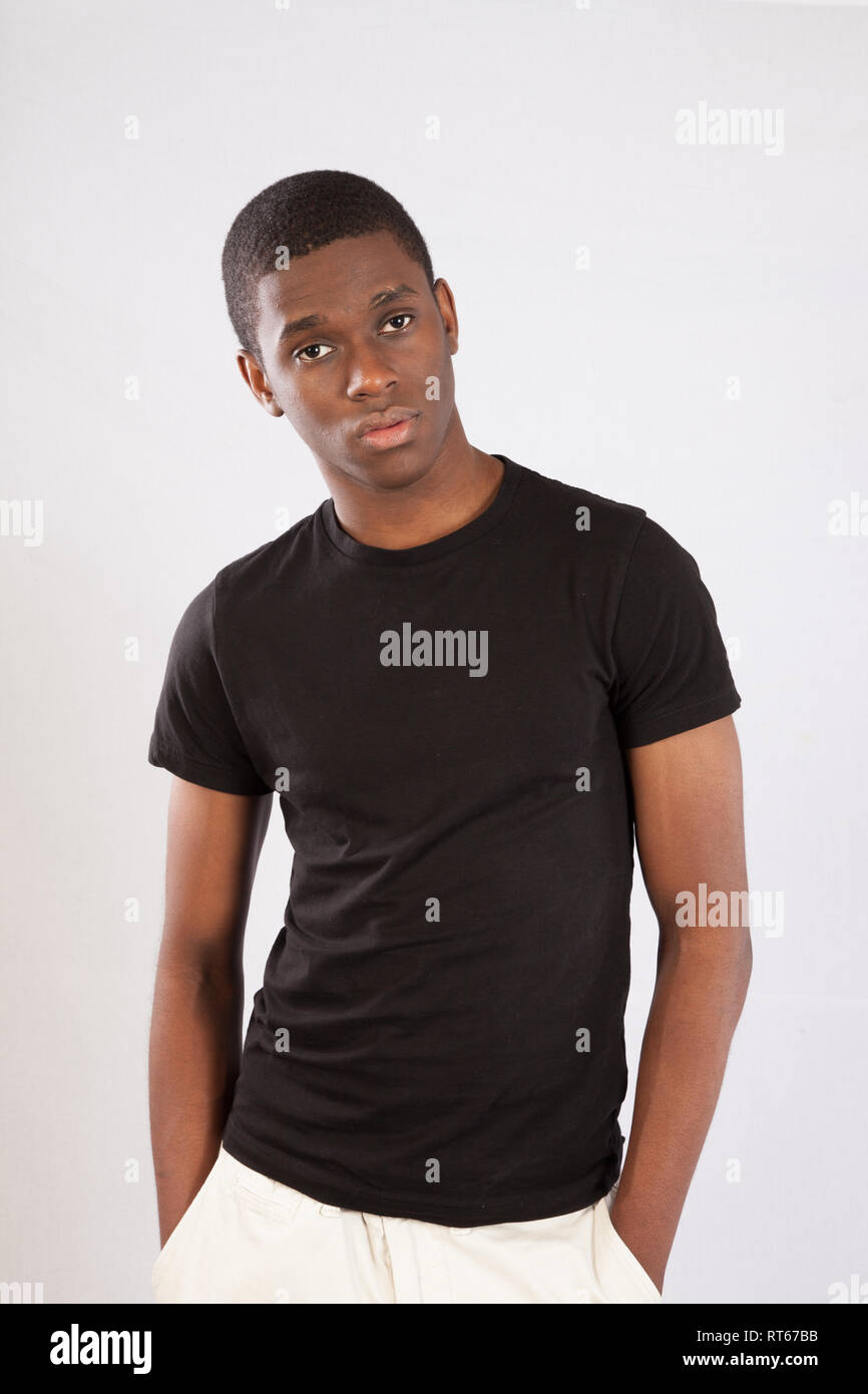 Thoughtful Black man looking seriouis Stock Photo - Alamy