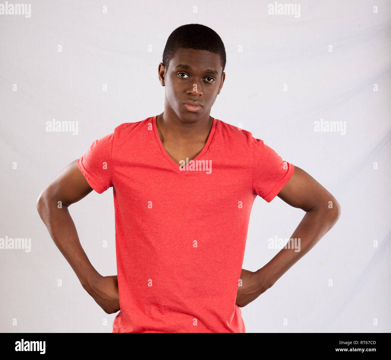 Thoughtful Black man looking seriouis Stock Photo - Alamy