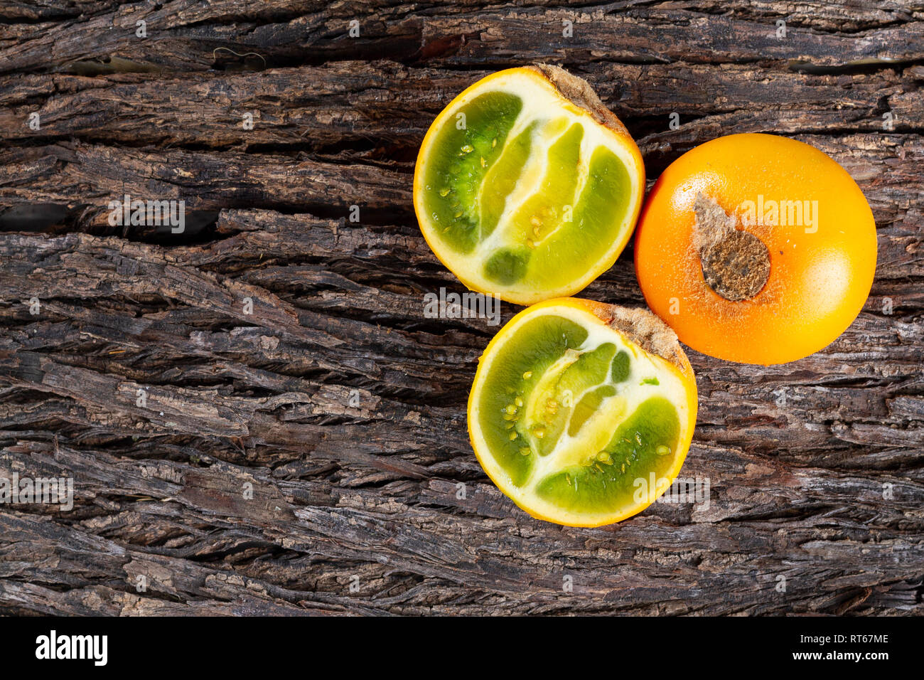 Fruit of lulo on tree bark (Solanum quitoense Stock Photo - Alamy