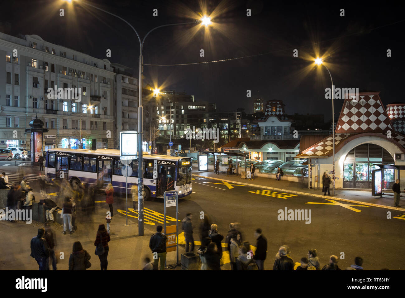 BELGRADE, SERBIA - DECEMBER 25, 2014: Crowd rushing into a bus waiting ...