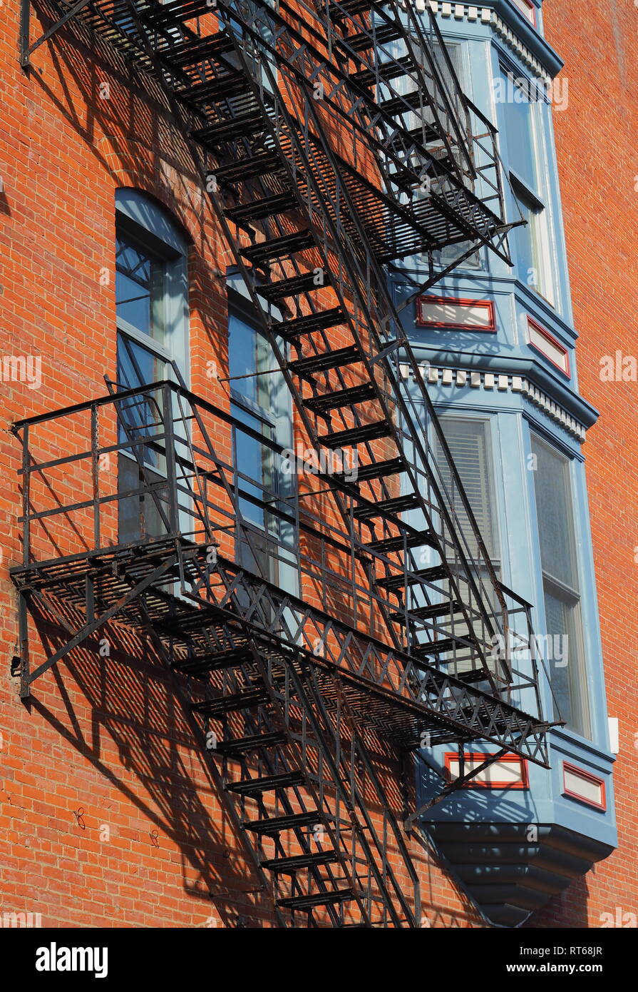 Rusty metal fire escape hi-res stock photography and images - Alamy