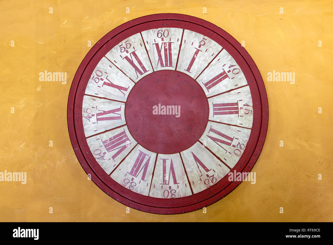 The empty face of clock without clock hands on yellow wall Stock Photo ...