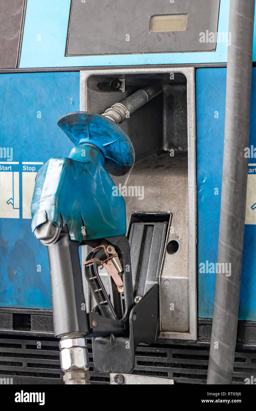 The gas station. The detailed view of the handle of the pistol from the ...